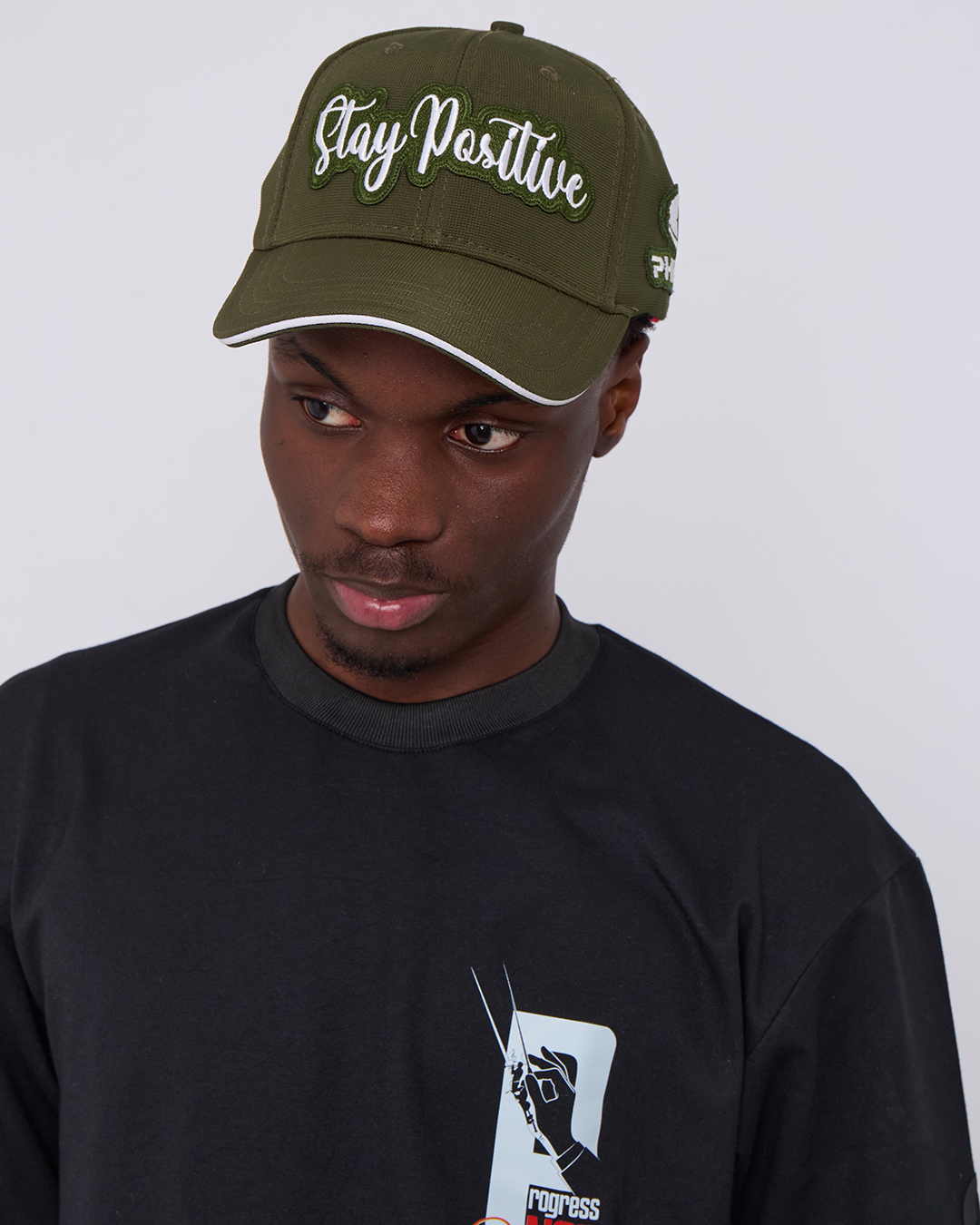 Olive green cap with "Stay Positive" embroidered in white - Phil413uk